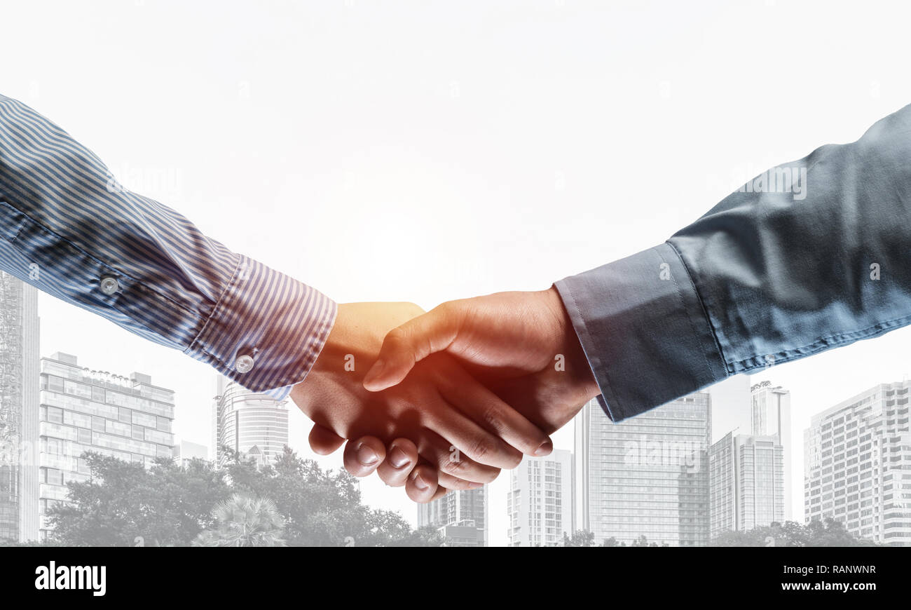 Business handshake as idea for unity and cooperation or greeting Stock ...