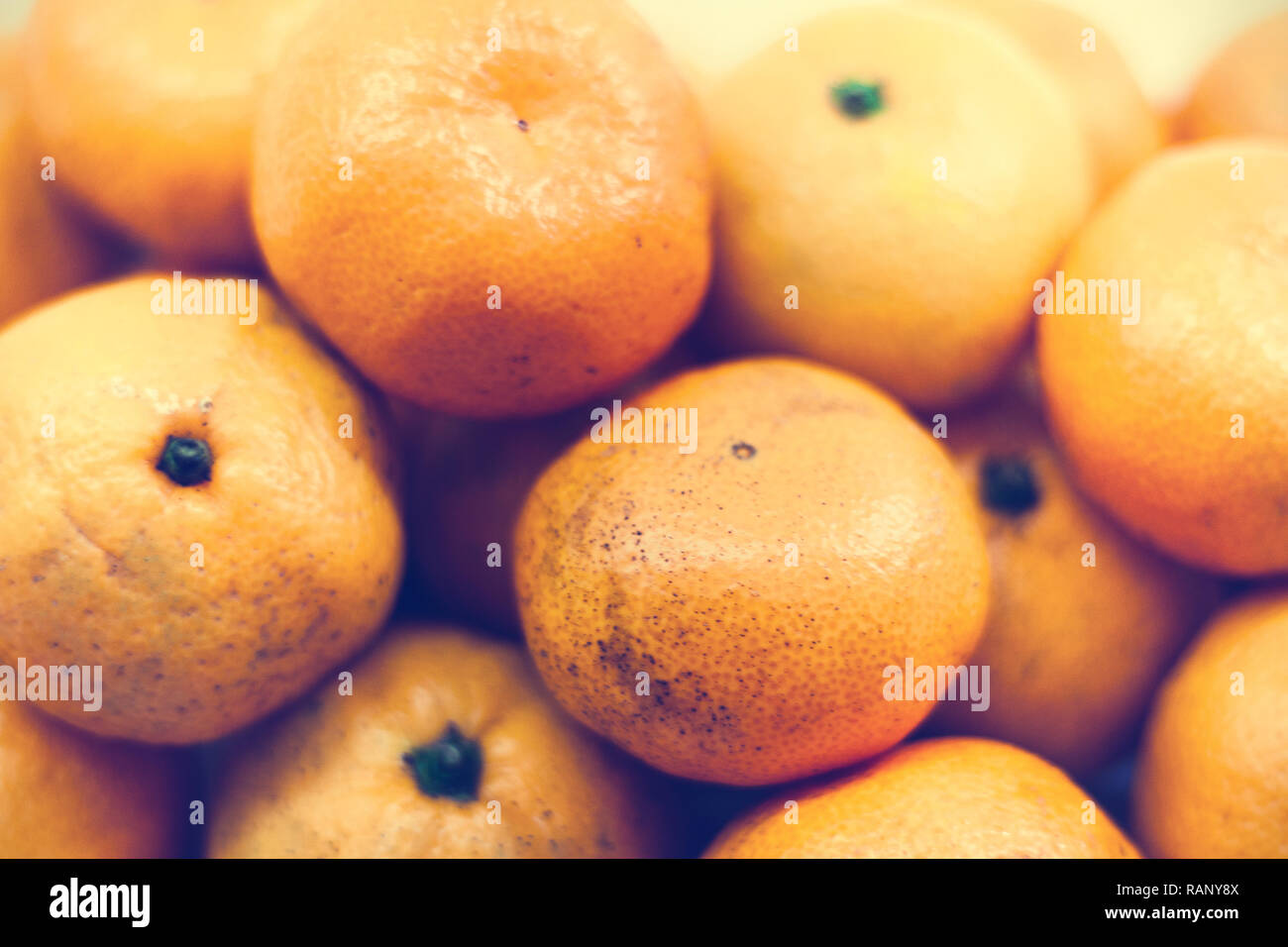 Fresh whole mandarin oranges background , top view Stock Photo - Alamy
