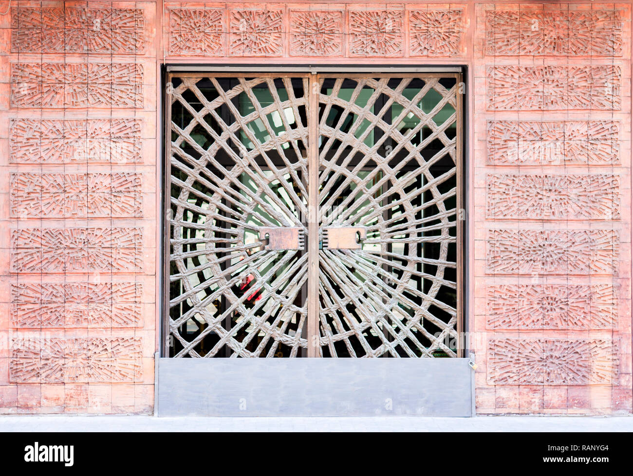 Entrance of old building decorated magnificent wrought-iron gates ...