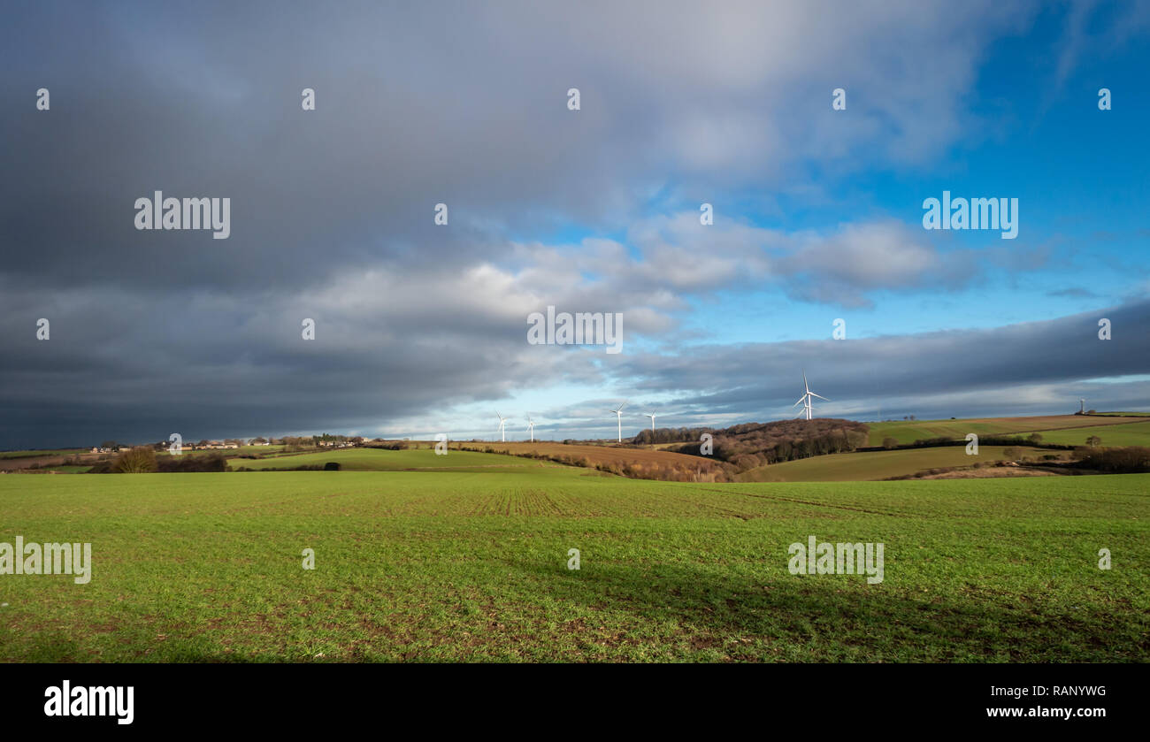 Winter view of the hills and countryside with wind turbines over Ulley ...