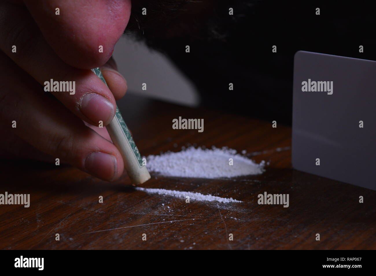 Person snorting narcotics, white powder Stock Photo - Alamy