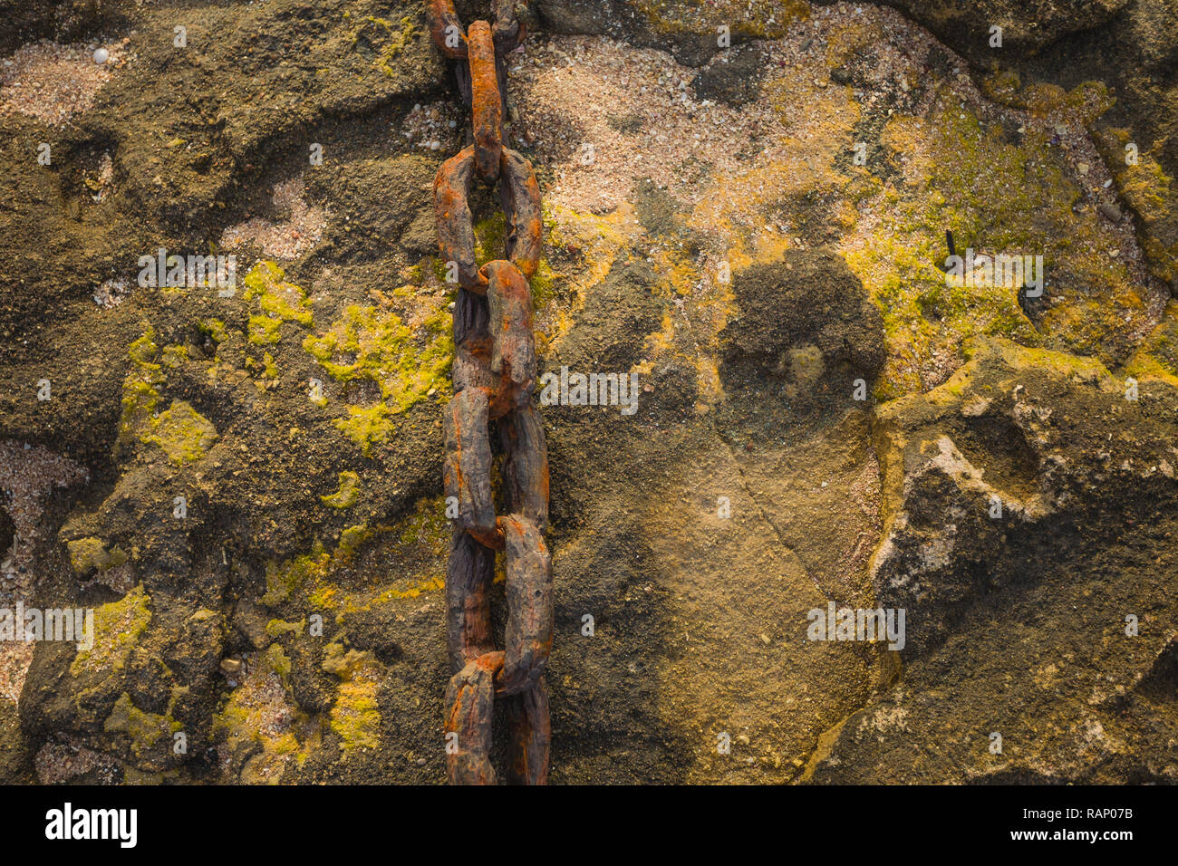 Old rusty chain underwater on sea bottom background. Horizontal color ...