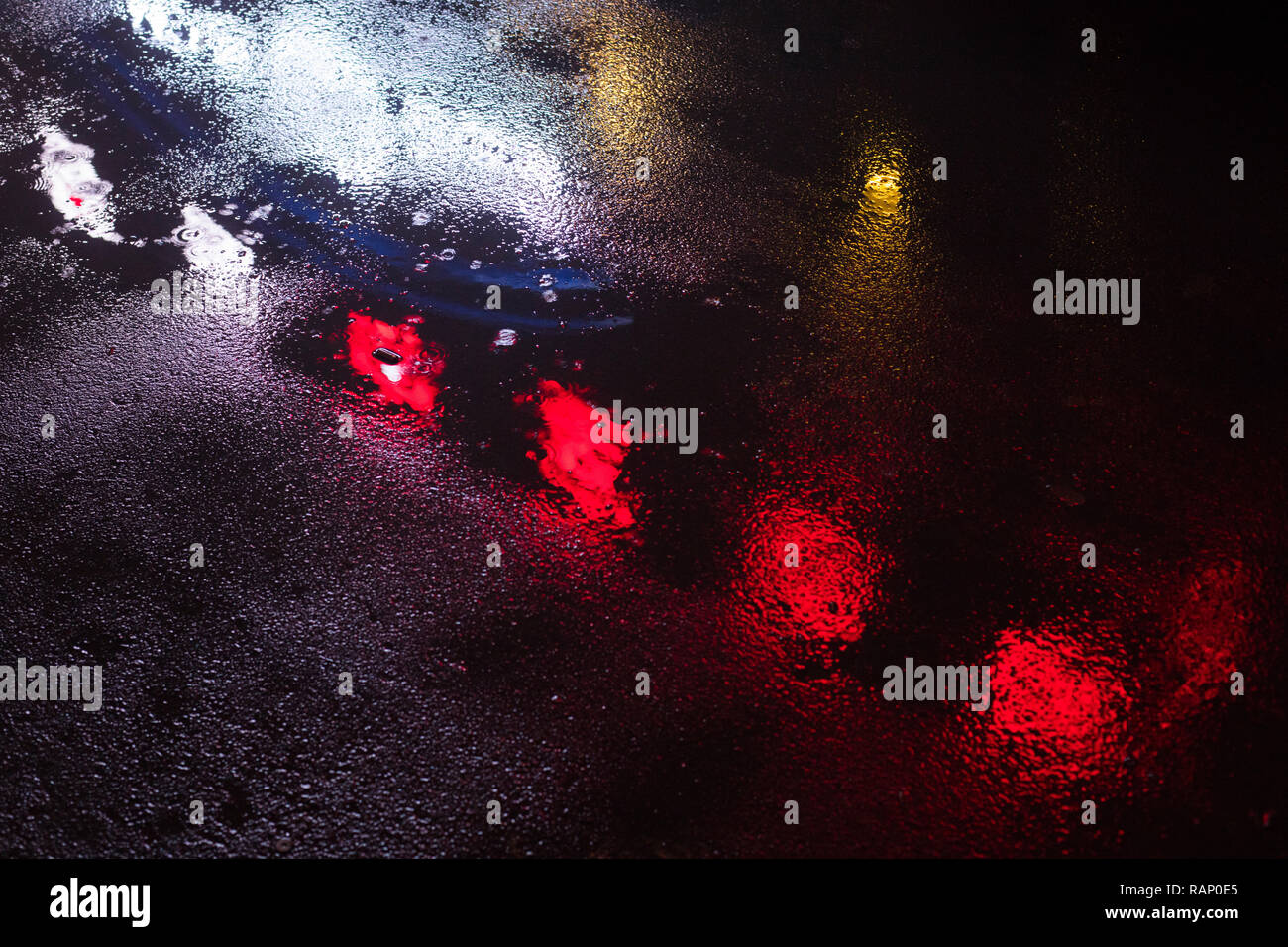 Reflection road rain neon sign hi-res stock photography and images - Alamy