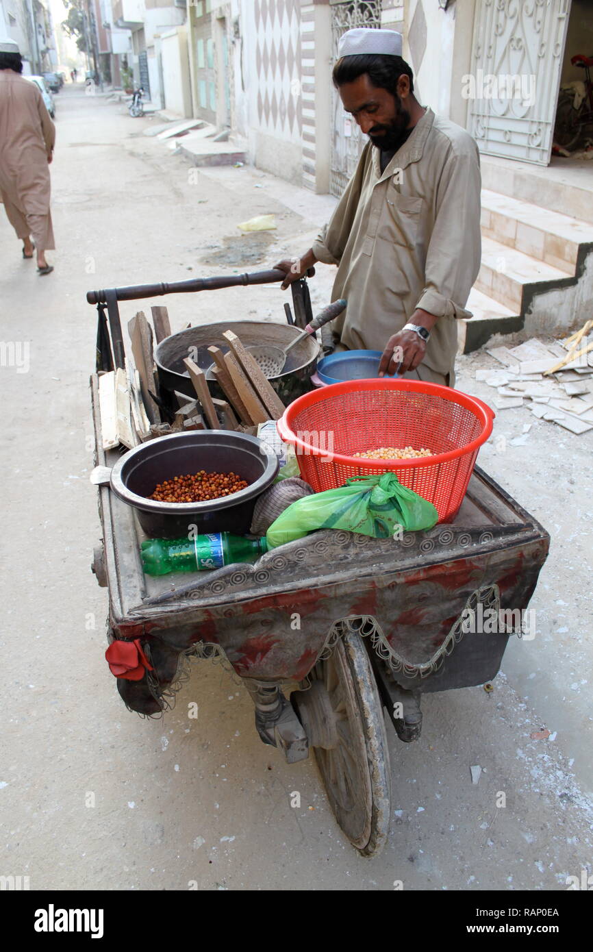 man selling corn Stock Photo - Alamy