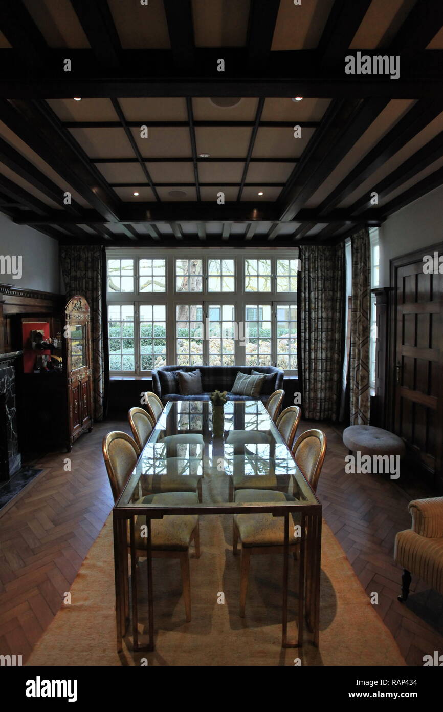 Glass table in the old living room, interior Stock Photo - Alamy