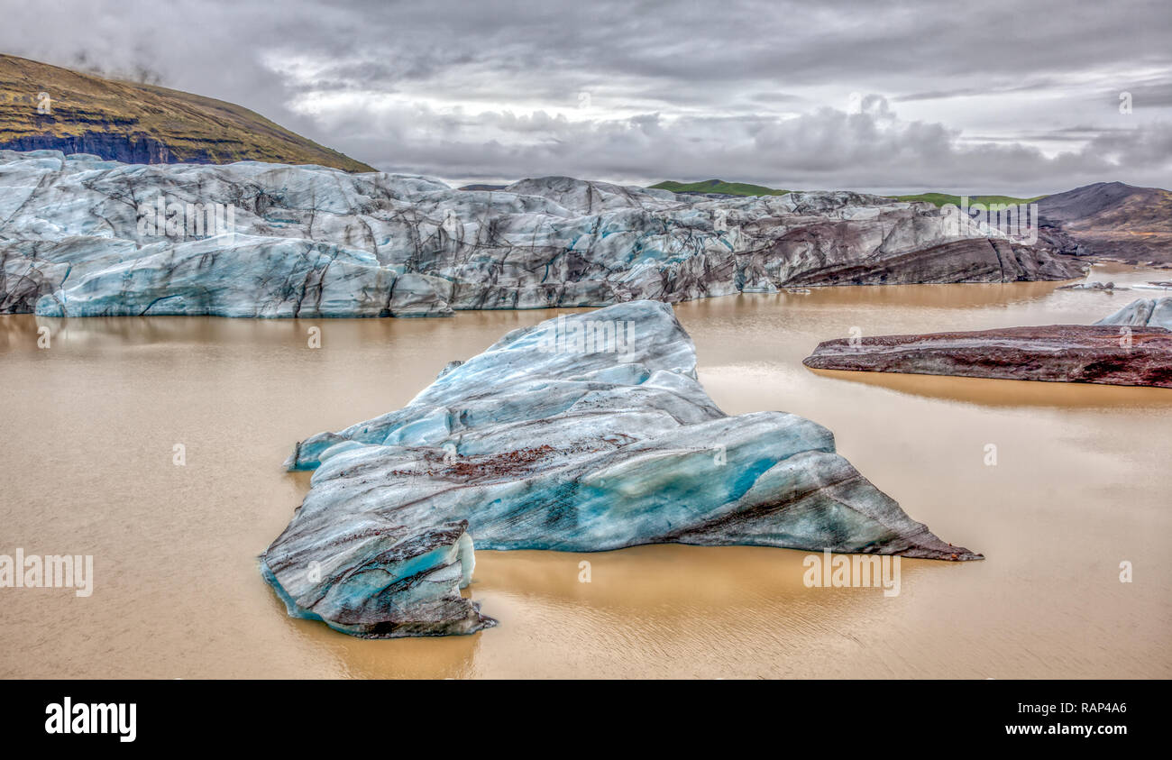 Photograph taken of a floating iceburg in Iceland. The iceberg and ...