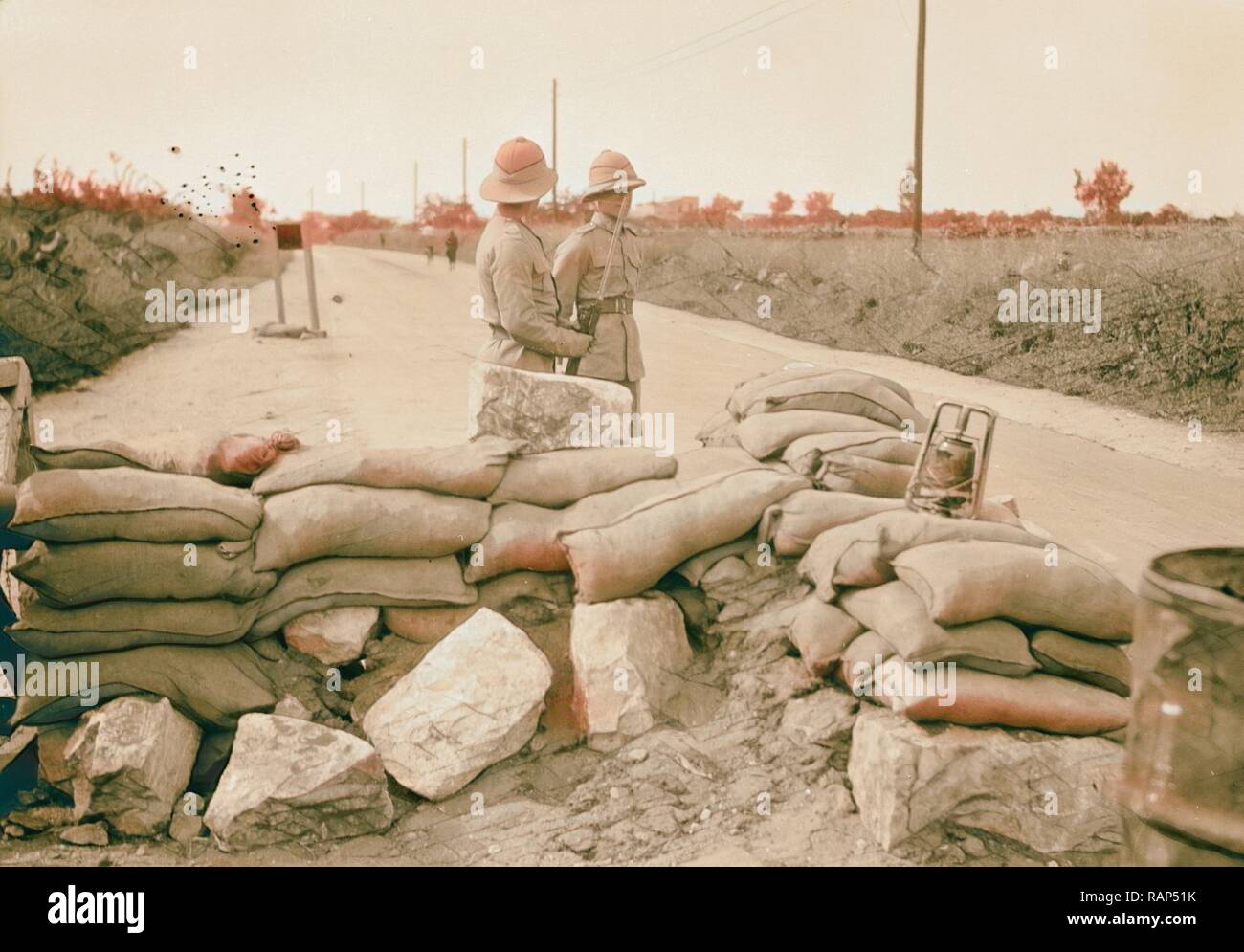 Military road block at junction Ramleh-Lydda Road, later with shade ...