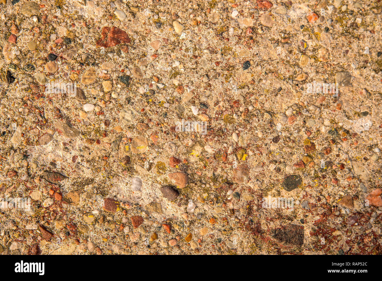Wall of concrete with stones Stock Photo - Alamy