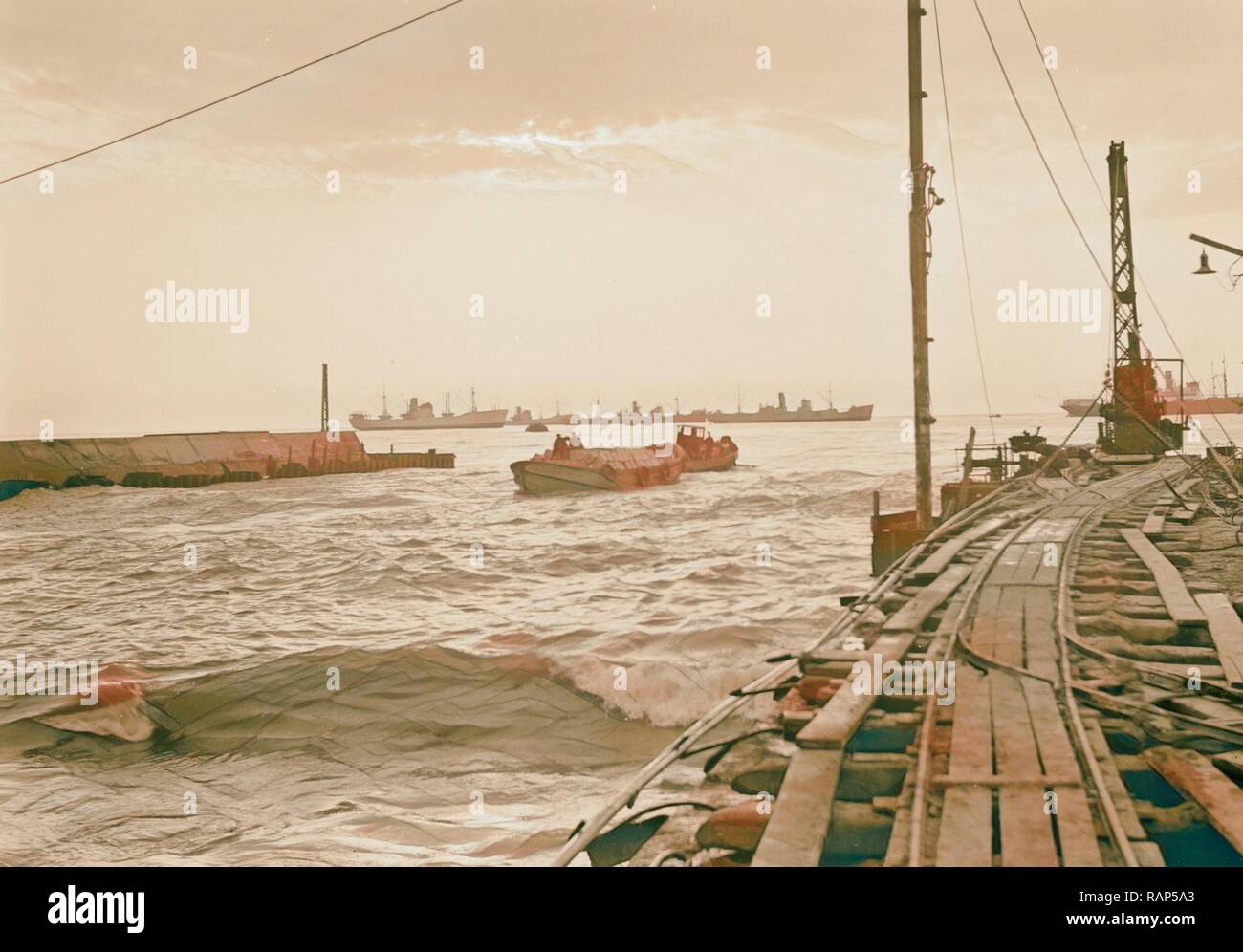 Tel Aviv Harbour. Setting sun, looking across lighter basin. 1939 ...