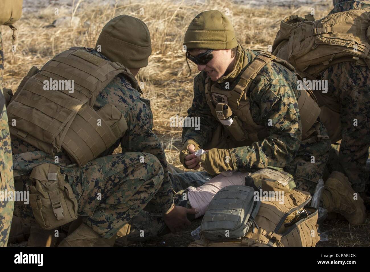 U.S. Navy HM2 (FMF) Charla Watson, a hospital corpsman with Alpha ...