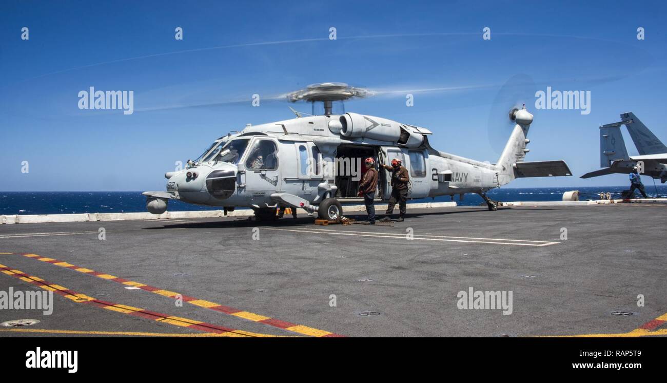 SOUTH CHINA SEA (Feb. 22, 2017) An MH-60R Sea Hawk from the “Blue Hawks ...