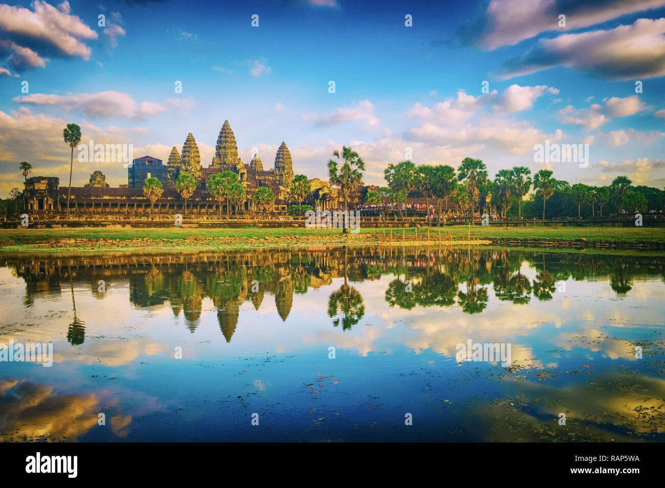 Angkor Wat temple reflecting in water of Lotus pond at sunset. Siem ...