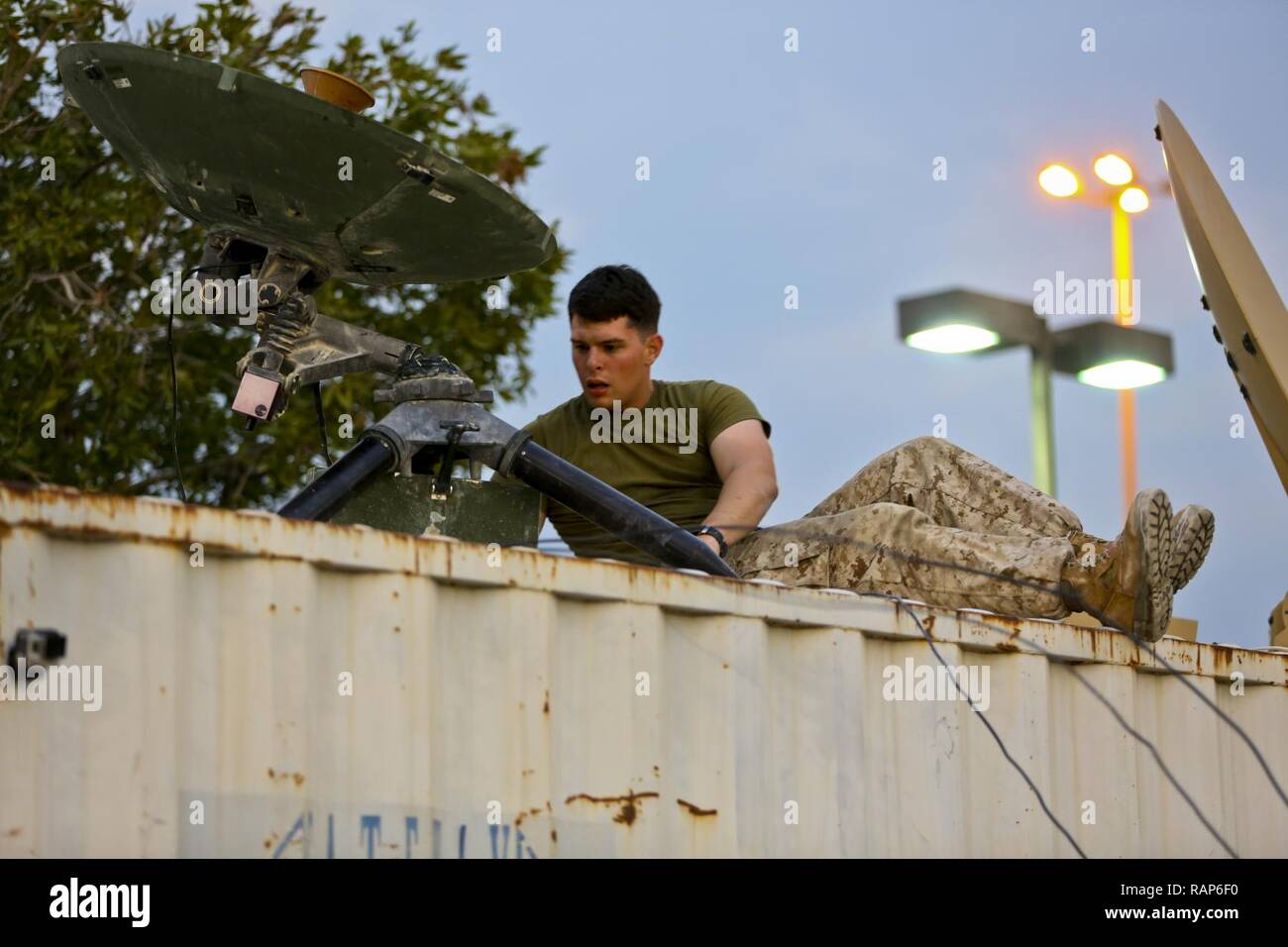 U.S. Marine Lance Cpl. Michael Kelley, a technical controller with ...