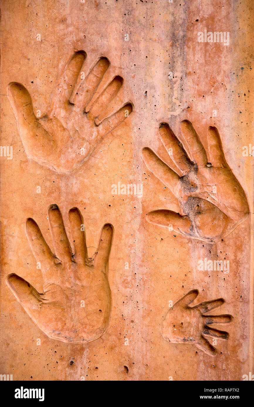 Hand Print Sign Symbol on Grunge Stone Wall Photo Stock Photo - Alamy