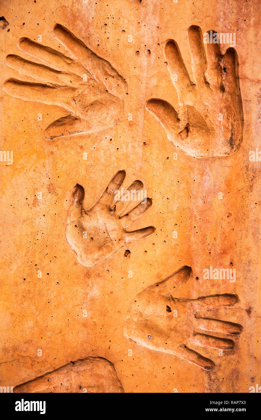 Hand Print Sign Symbol on Grunge Stone Wall Photo Stock Photo - Alamy