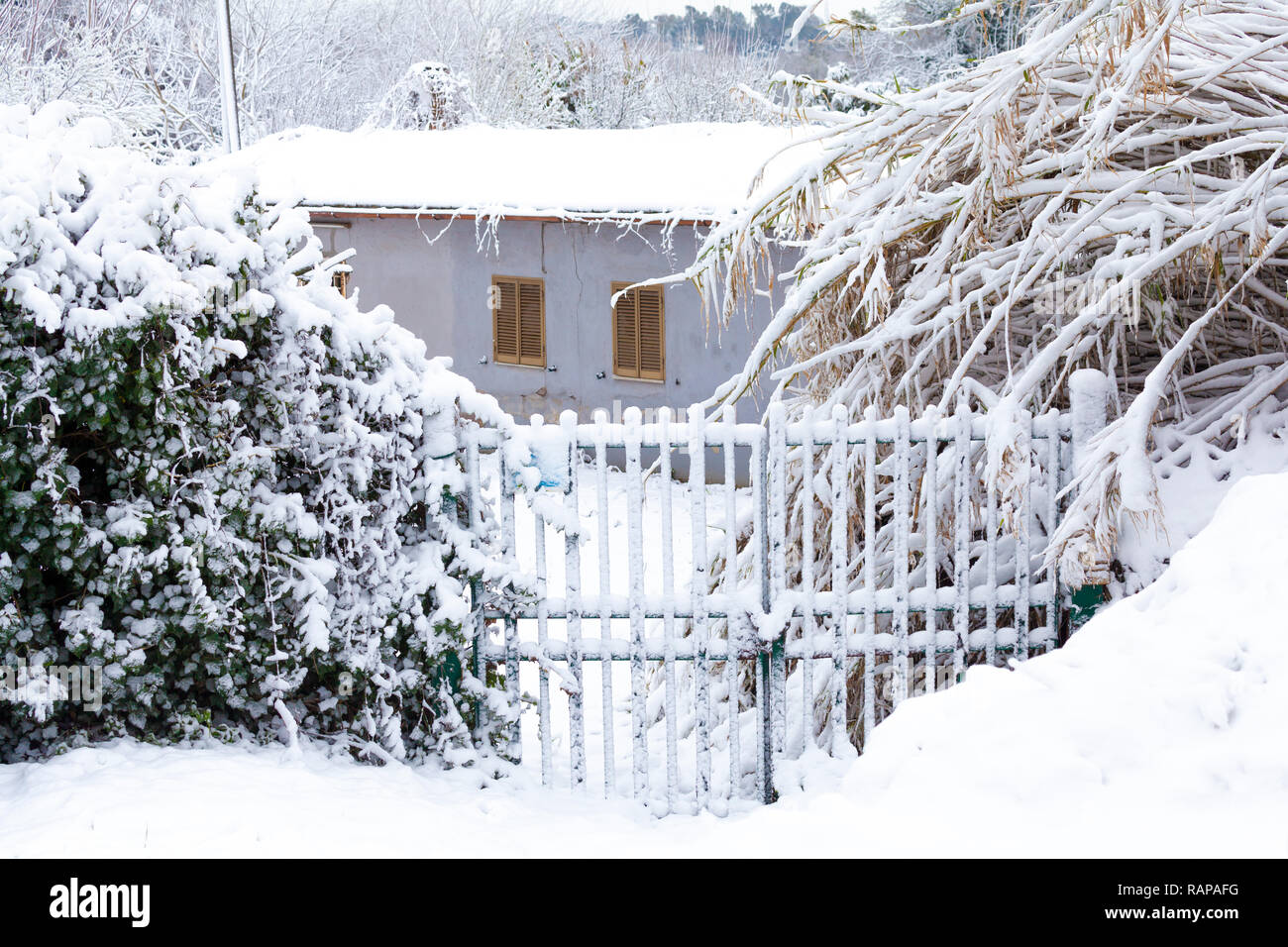 Little House Closed Gate after a long snowfall (Rome Stock Photo - Alamy
