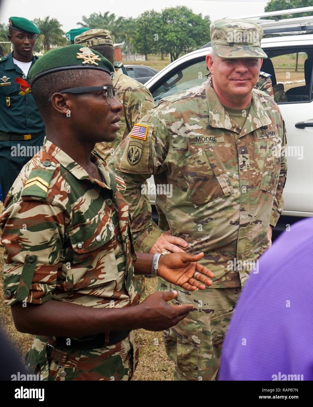 A Cameroonian military engineer translates for Brig. Gen. Kenneth Moore ...
