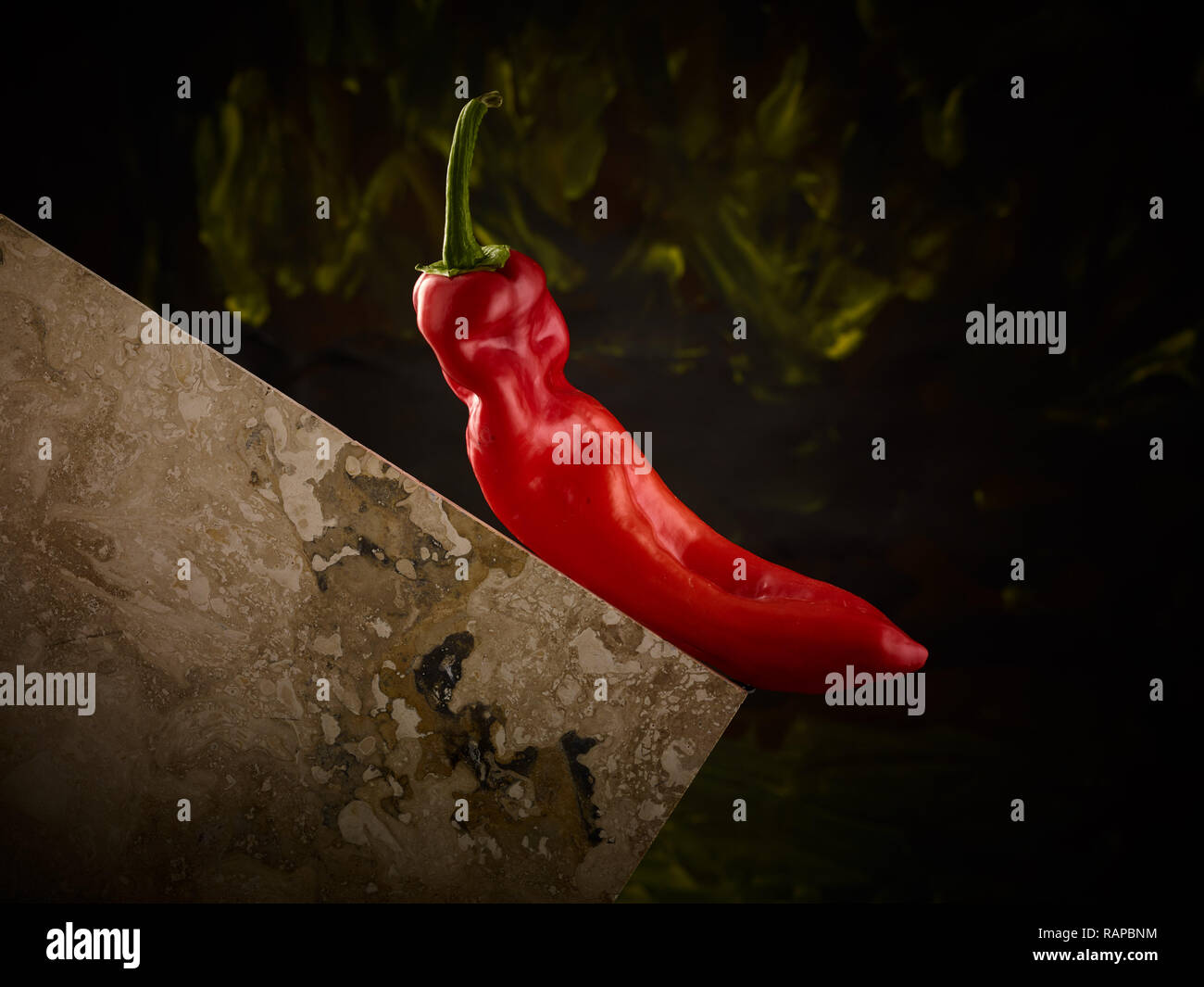 Red pepper and tile abstract culinary still-life photograph Stock Photo ...