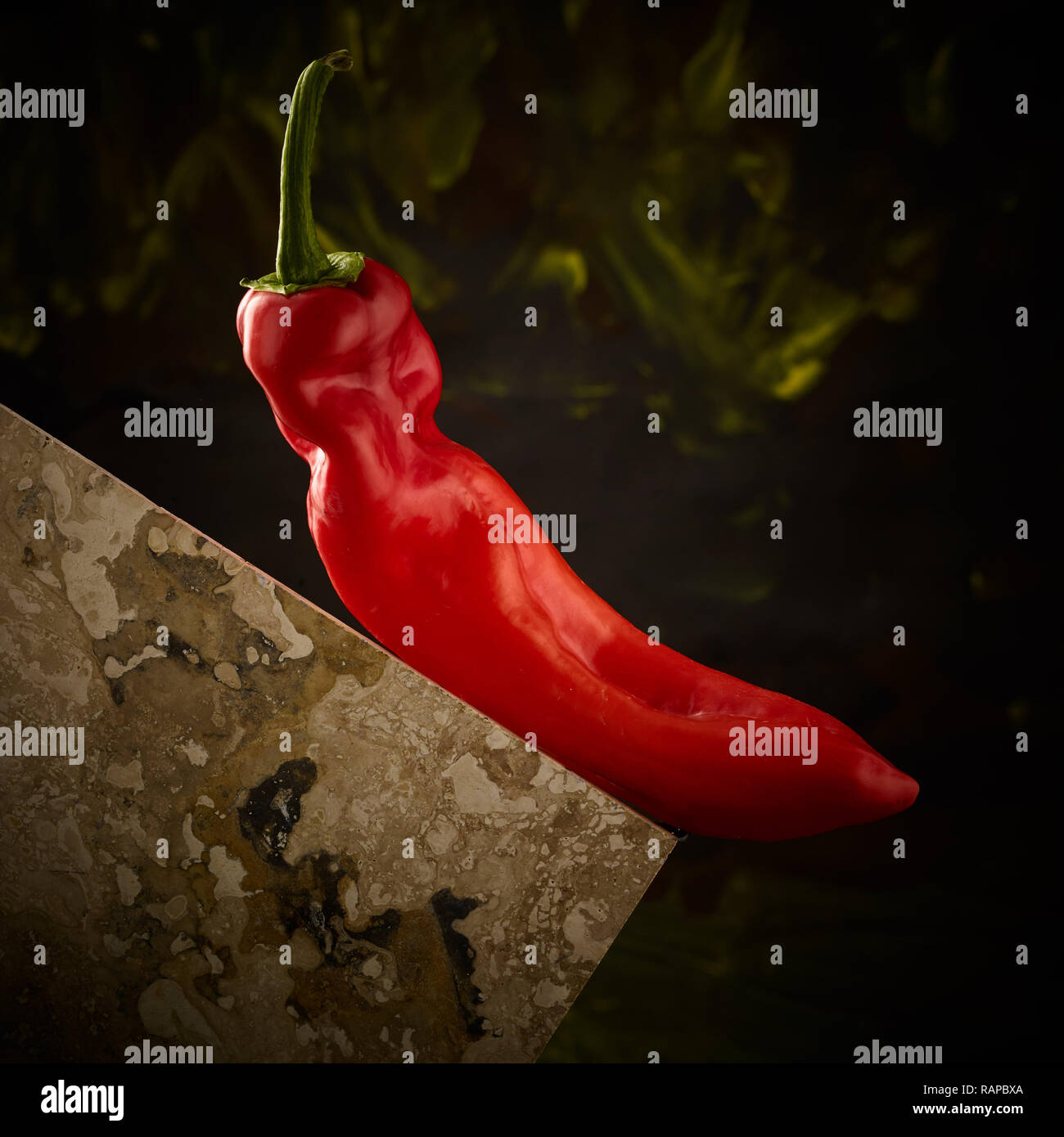Red pepper and tile abstract culinary still-life photograph Stock Photo ...