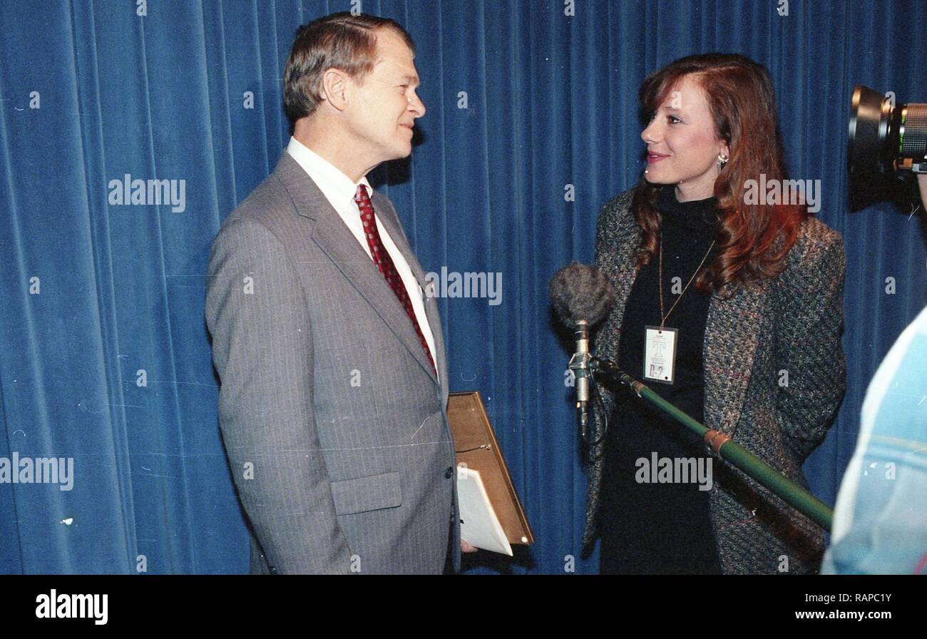 THESE TWO PEOPLE ARE HAVING A CONVERSATION WITH CAMERA AND MIC IN FRONT ...