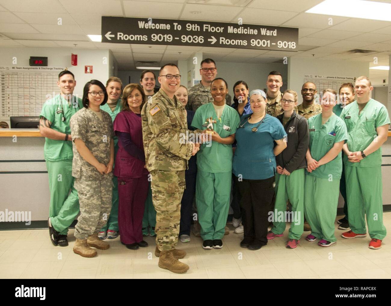 Maj. Jerry Moon (center), nurse methods analyst, Nursing Operations ...