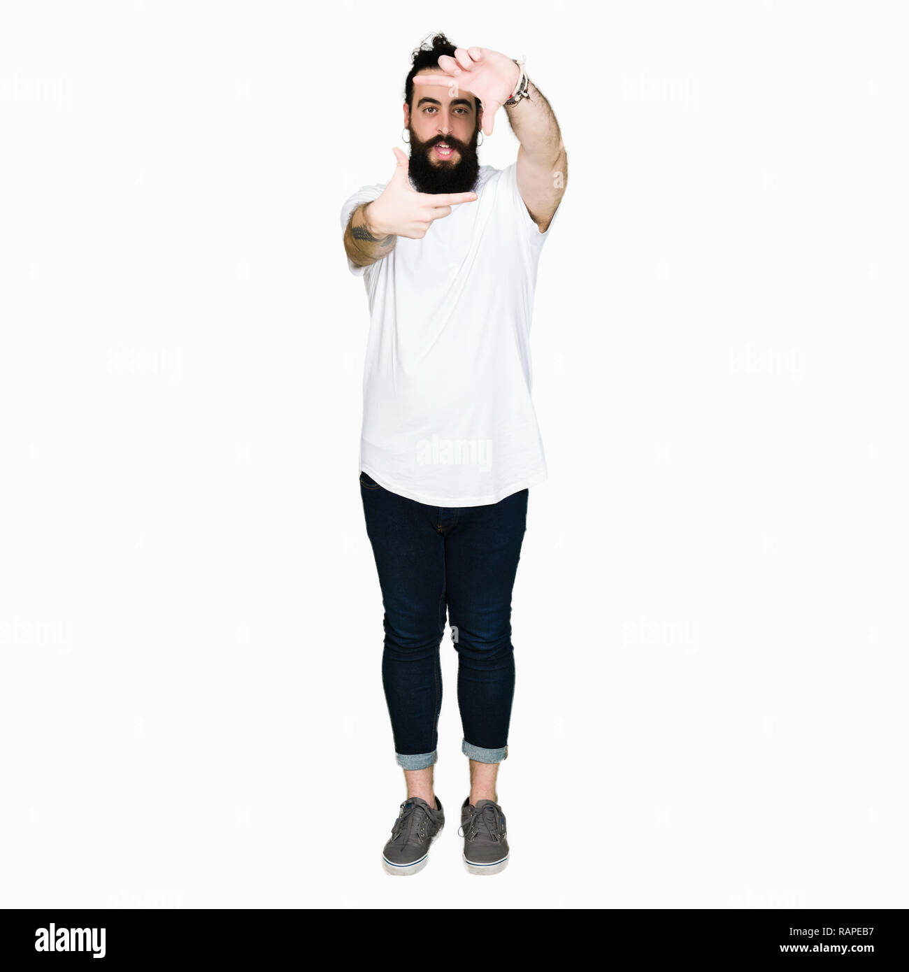 Young hispanic man beard framing Cut Out Stock Images & Pictures - Alamy