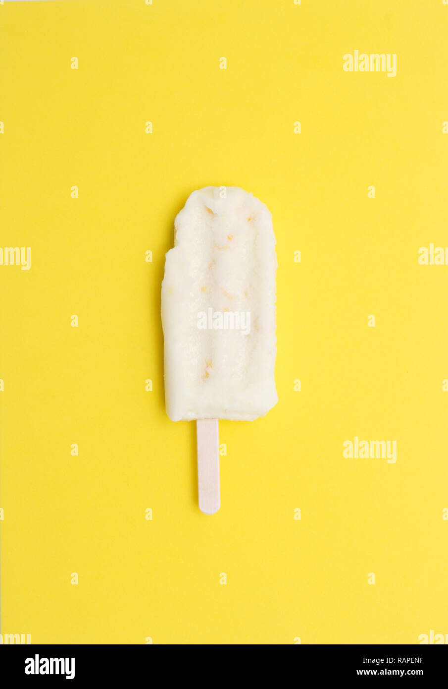 Ice cream on yellow background Stock Photo - Alamy
