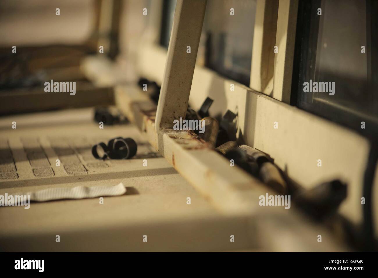 .50 caliber shell casings liter the hood of a vehicle, during Decisive ...