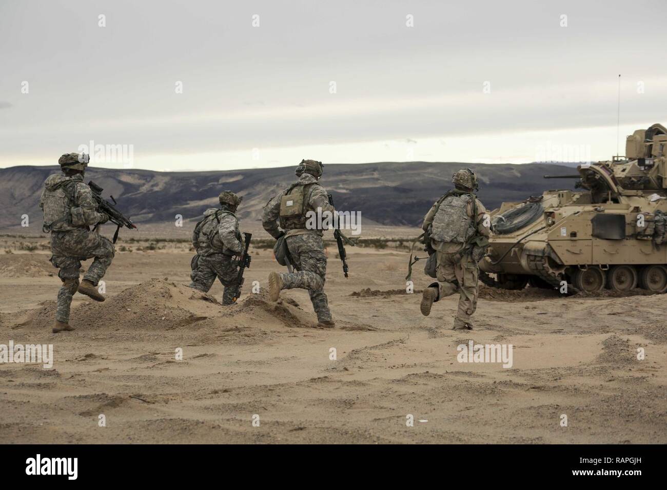 U.S. Soldiers, assigned to 2nd Brigade, 1st Cavalry Division, retreat ...