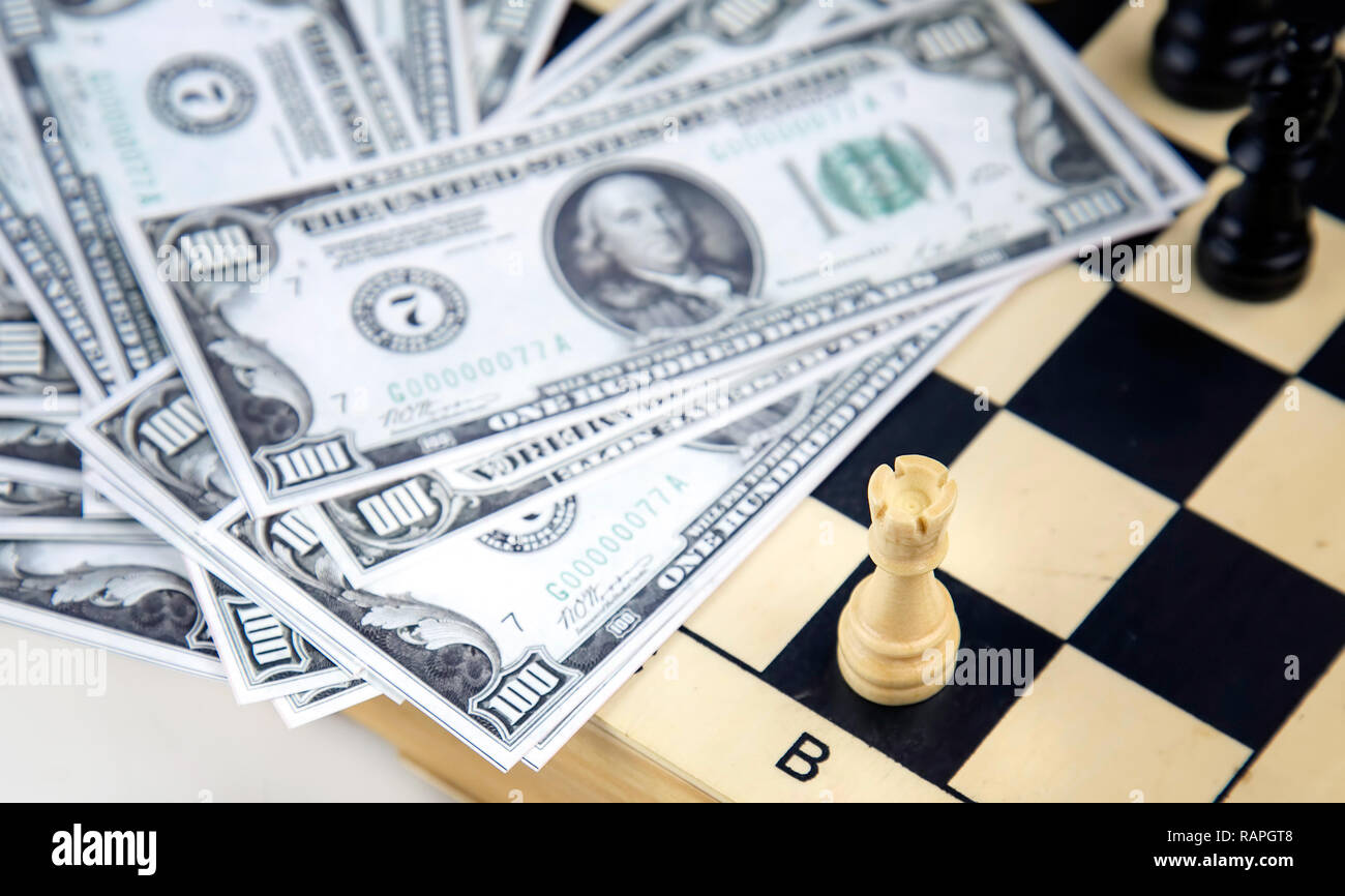Strategy Playing Game Chess and Money on Chessboard Stock Photo - Alamy