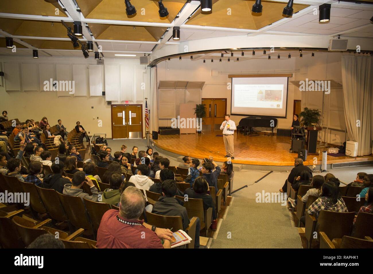 Japan Engineer District employees provide a presentation during ...