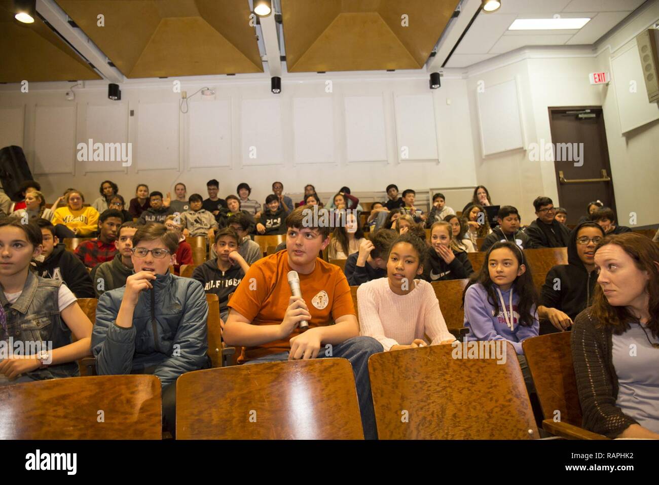 John Harris, Jr., seventh-grader at ZAMS, asks a question during the ...