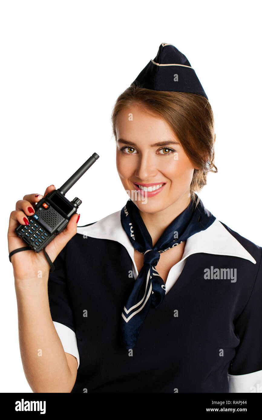 Beautiful smiling stewardess with cb radio, isolated on a white ...