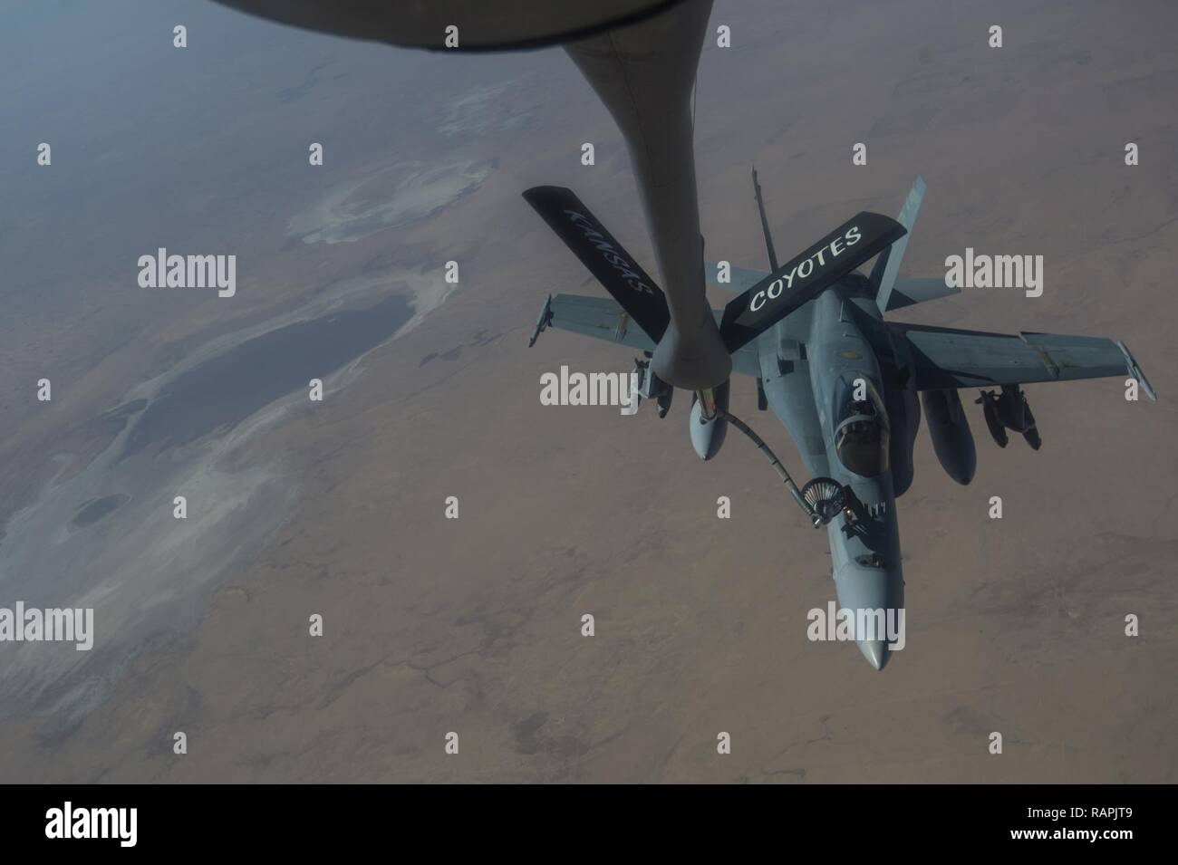 A Royal Australian Air Force F/A-18 Super Hornet refuels from a U.S ...