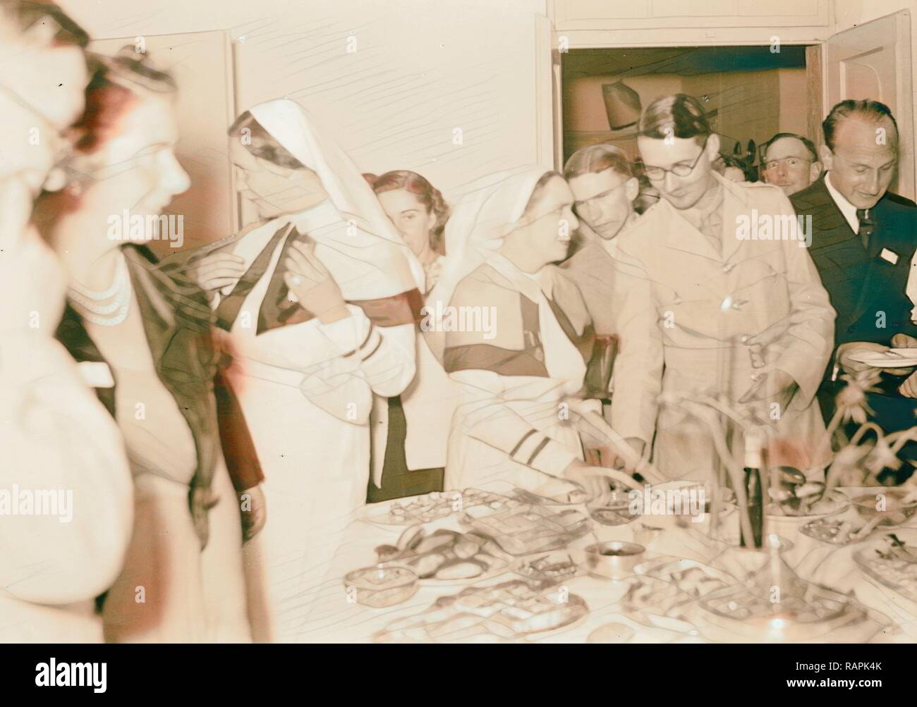 Dance in Dr. & Mrs. Wren's house Nurses & other guests around buffet ...