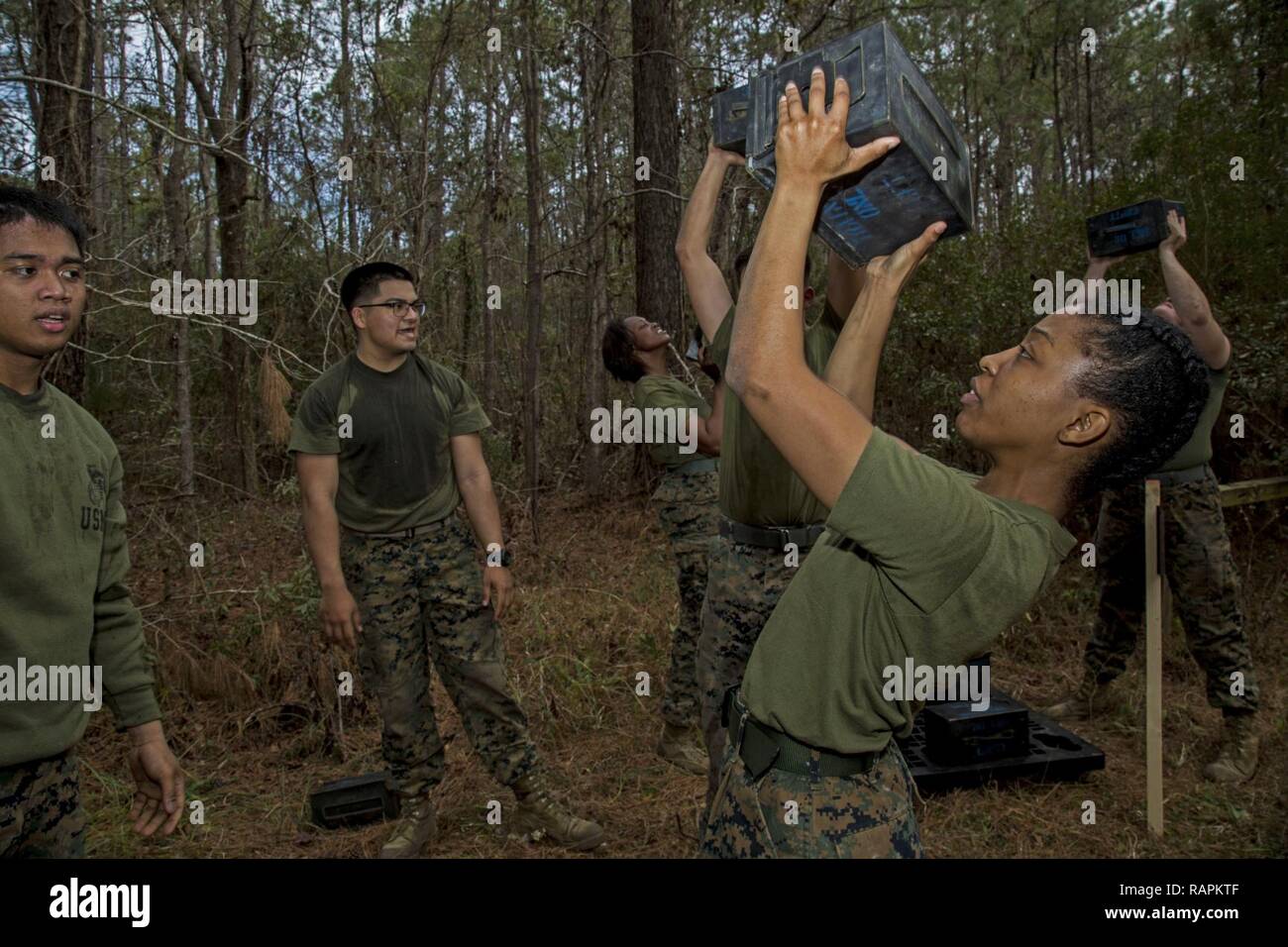 U.S. Marine Corps Cpl. Aaliyah B. Carbon, right, administrative ...