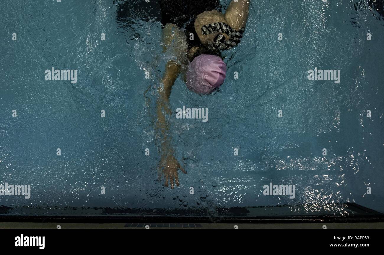 Ashley Crites, Air Force Wounded Warrior Trials competitor, reaches for ...