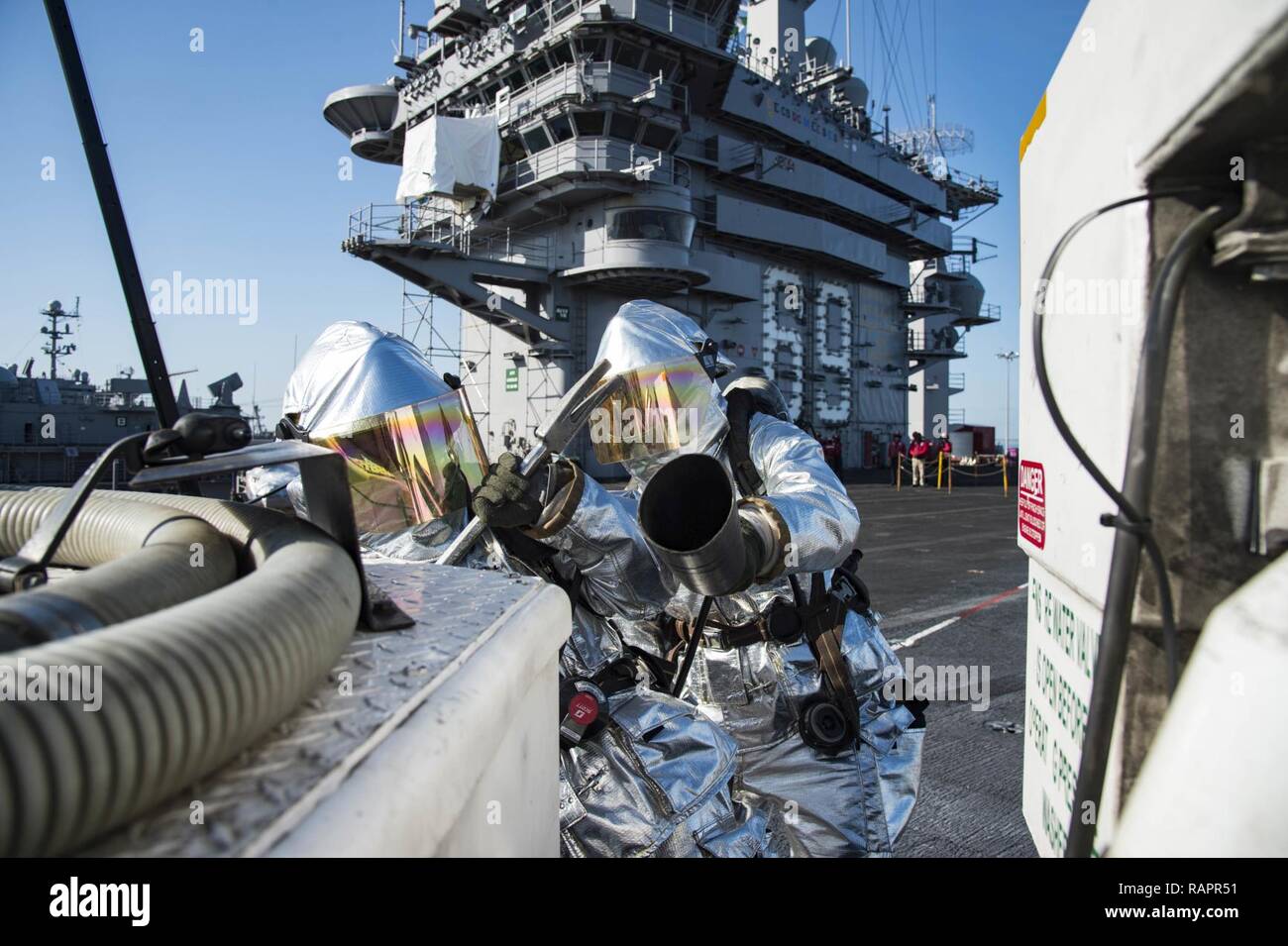 NORFOLK (Feb. 28, 2017) Sailors combat a simulated fire during a mass ...