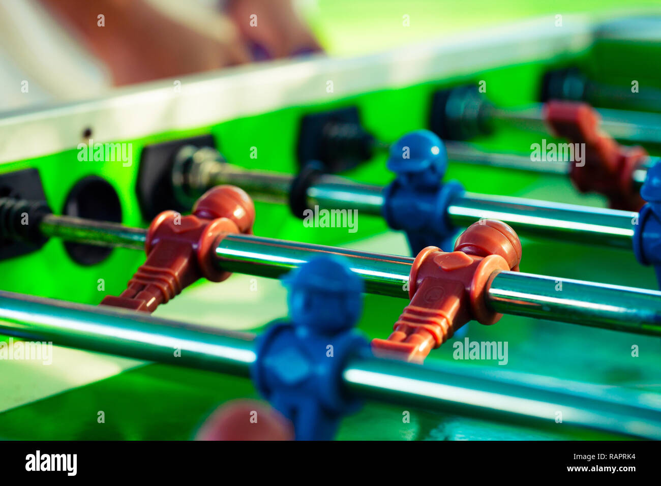 Sport Football Game Playing on Table Soccer controlling players with ...