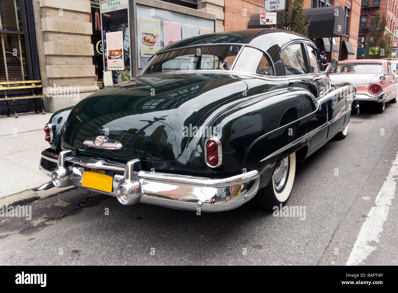 Rear view of a classic vintage American car in the street of NYC Stock ...