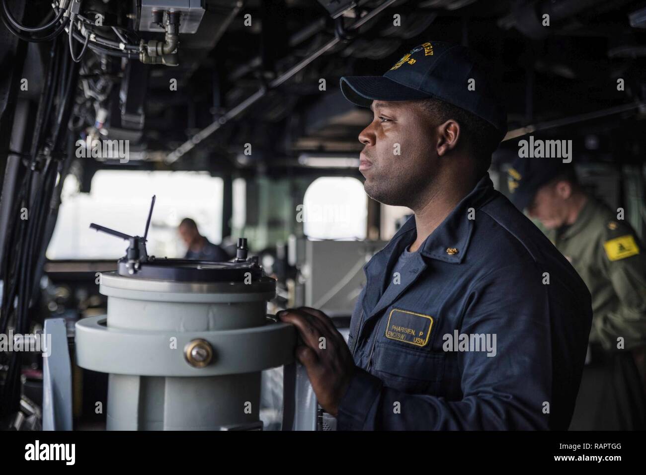 SOUTH CHINA SEA (March 2, 2017) Chief Engineman Paris Pharisien stands ...