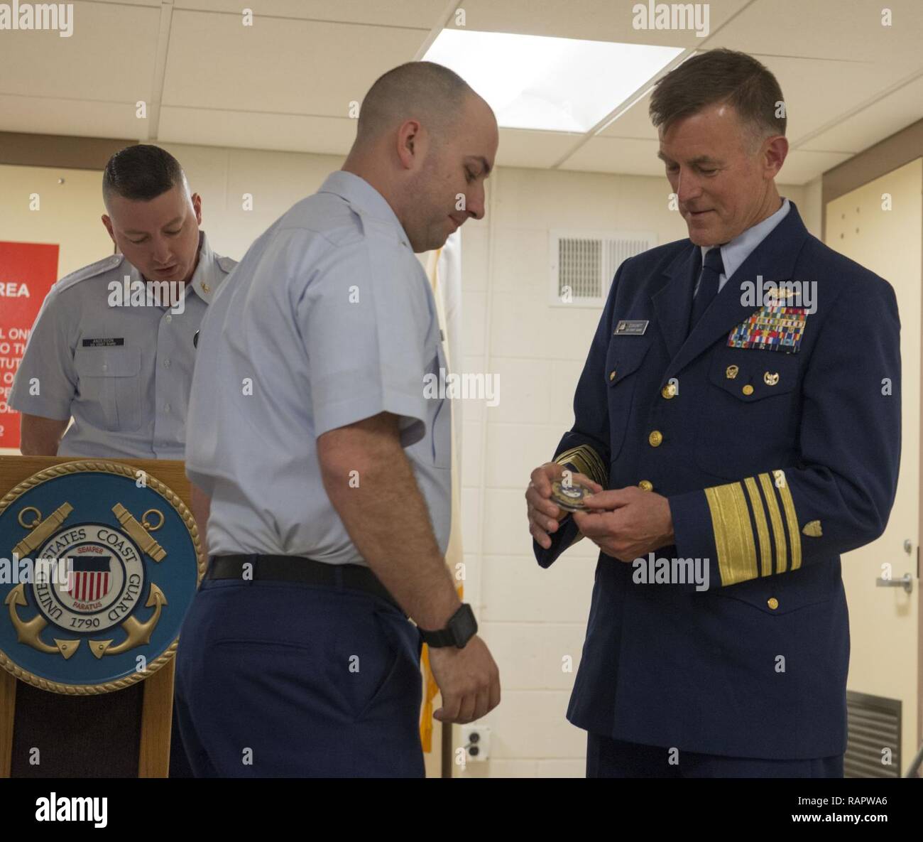 Adm. Paul F. Zukunft, commandant of the U.S. Coast Guard, presents ...