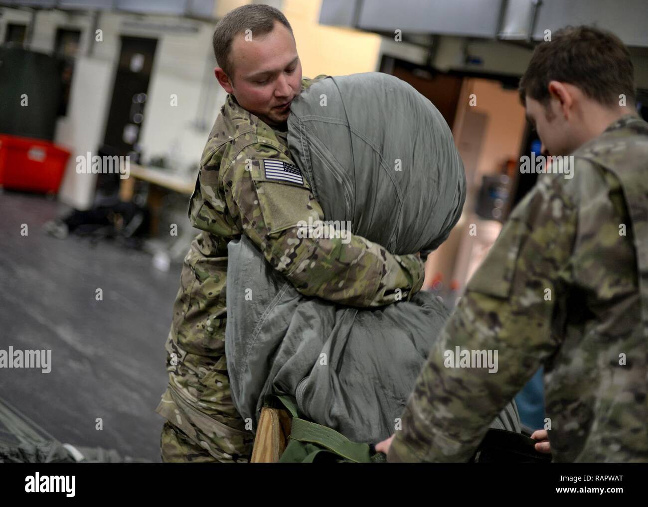 U.S. Air Force Staff Sgt. Brian Demik, left, and U.S. Air Force Staff ...
