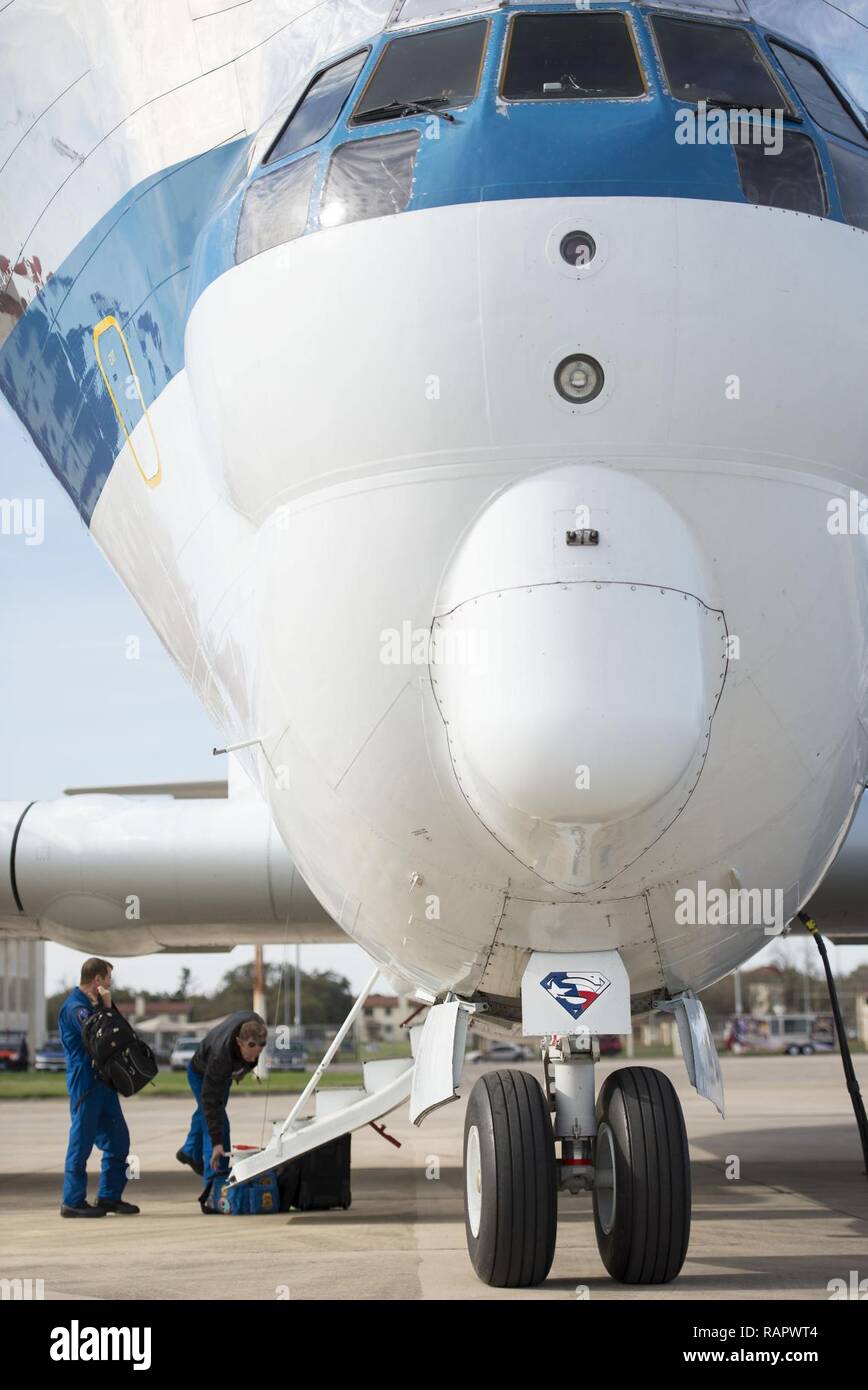 NASA pilots deboard the B-377 Super Guppy after arriving at Joint Base ...