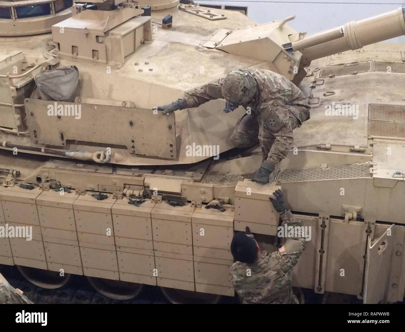 Tank and maintenance crews with 1st Battalion, 66th Armor Regiment, 3rd ...