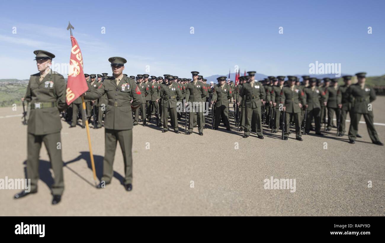 U.S. Marines with the 5th Marine Regiment, 1st Marine Division stand in ...