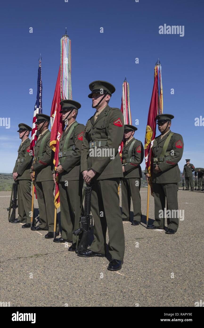U.S. Marines with the 5th Marine Regiment, 1st Marine Division stand in ...