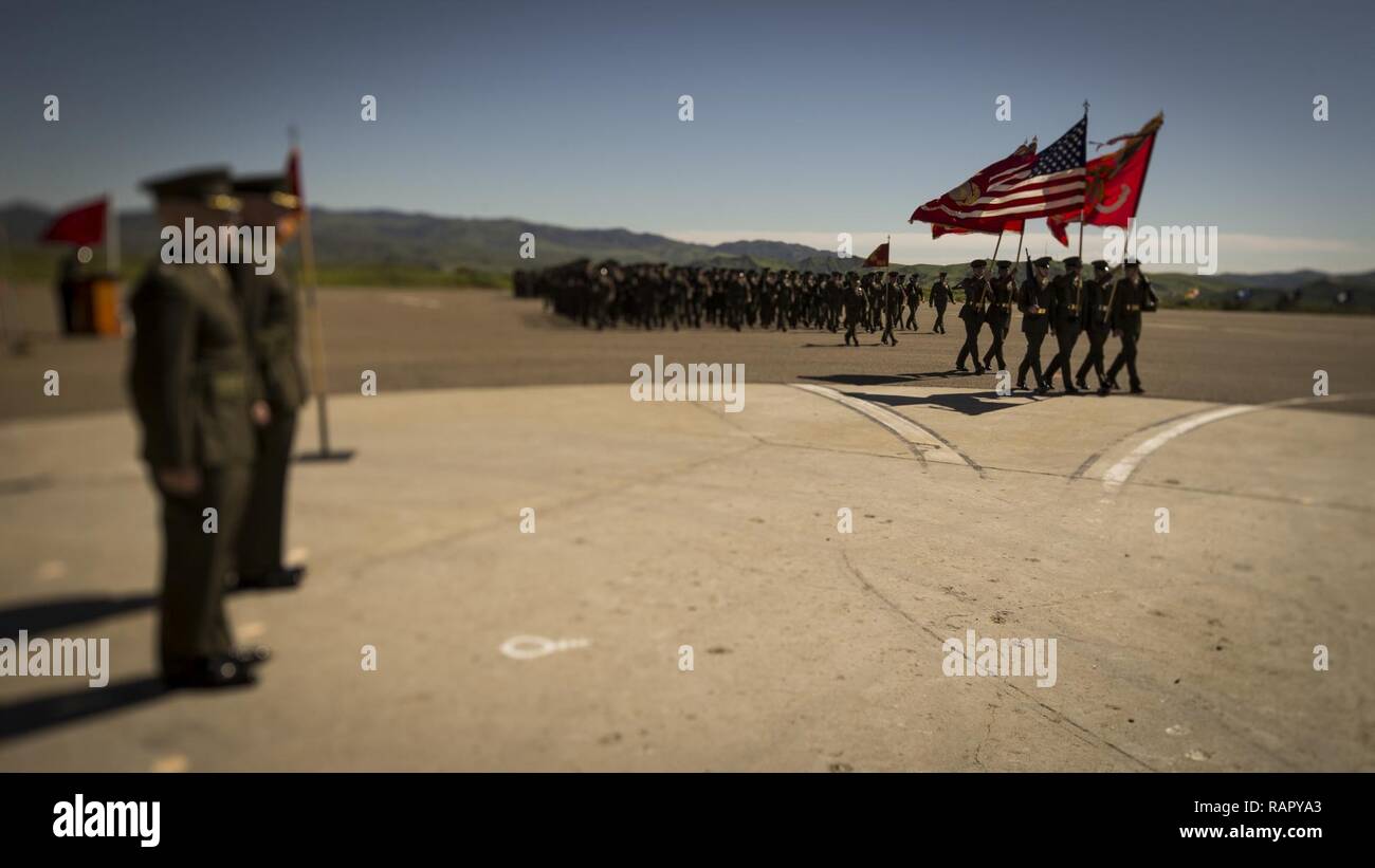 U.S. Marines with 5th Marine Regiment, 1st Marine Division, conduct a ...