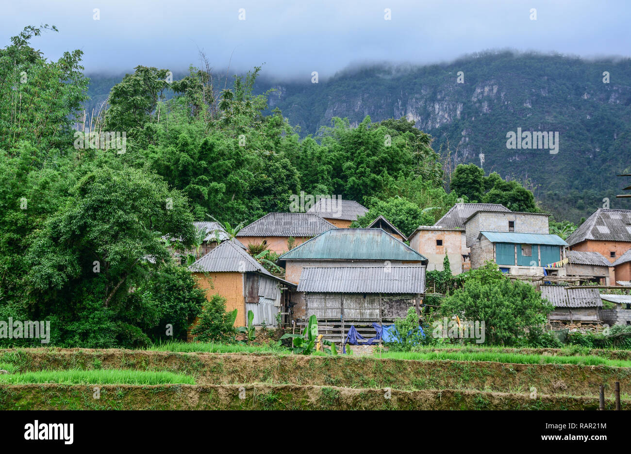 Vietnamese traditional house at mountain village in Northern Vietnam ...