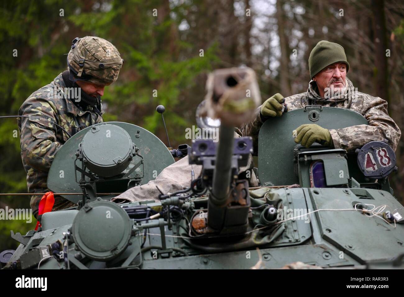 Ukrainian Armor Crew Members enjoy a pause in the action at Combined ...